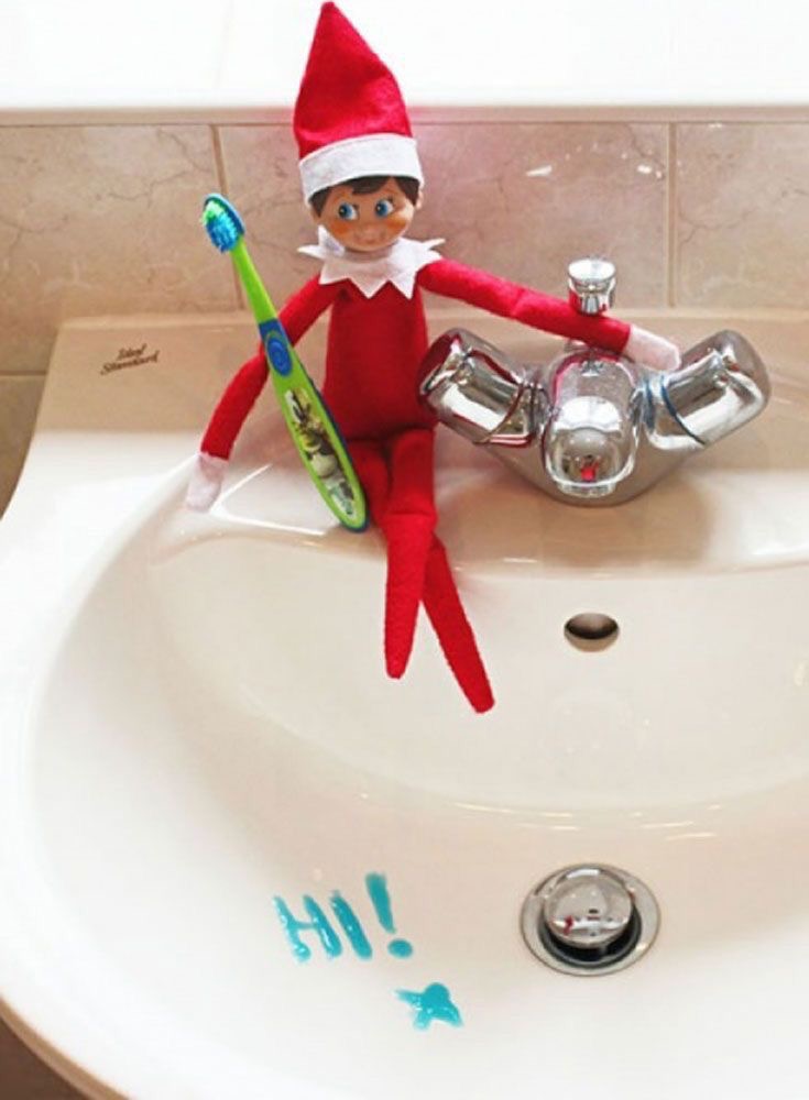 elf with toothbrush